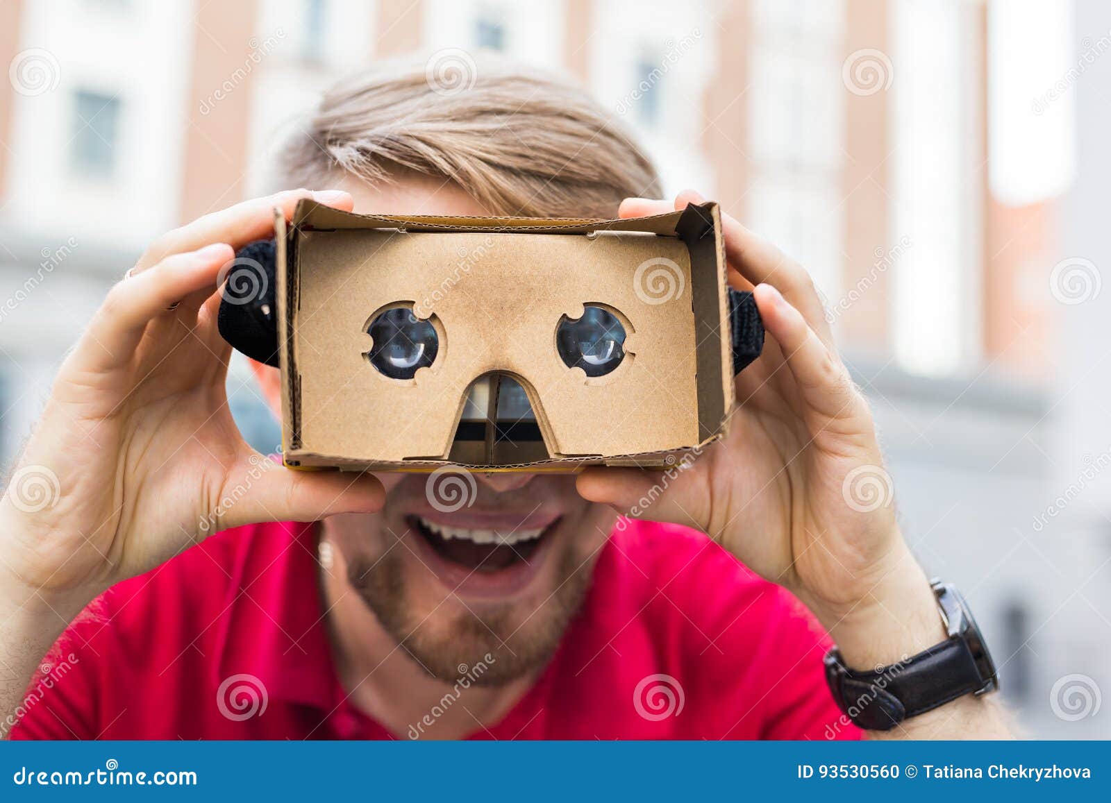 Close-up of Funny Man Using Cardboard Virtual Reality Goggle Outdoors ...