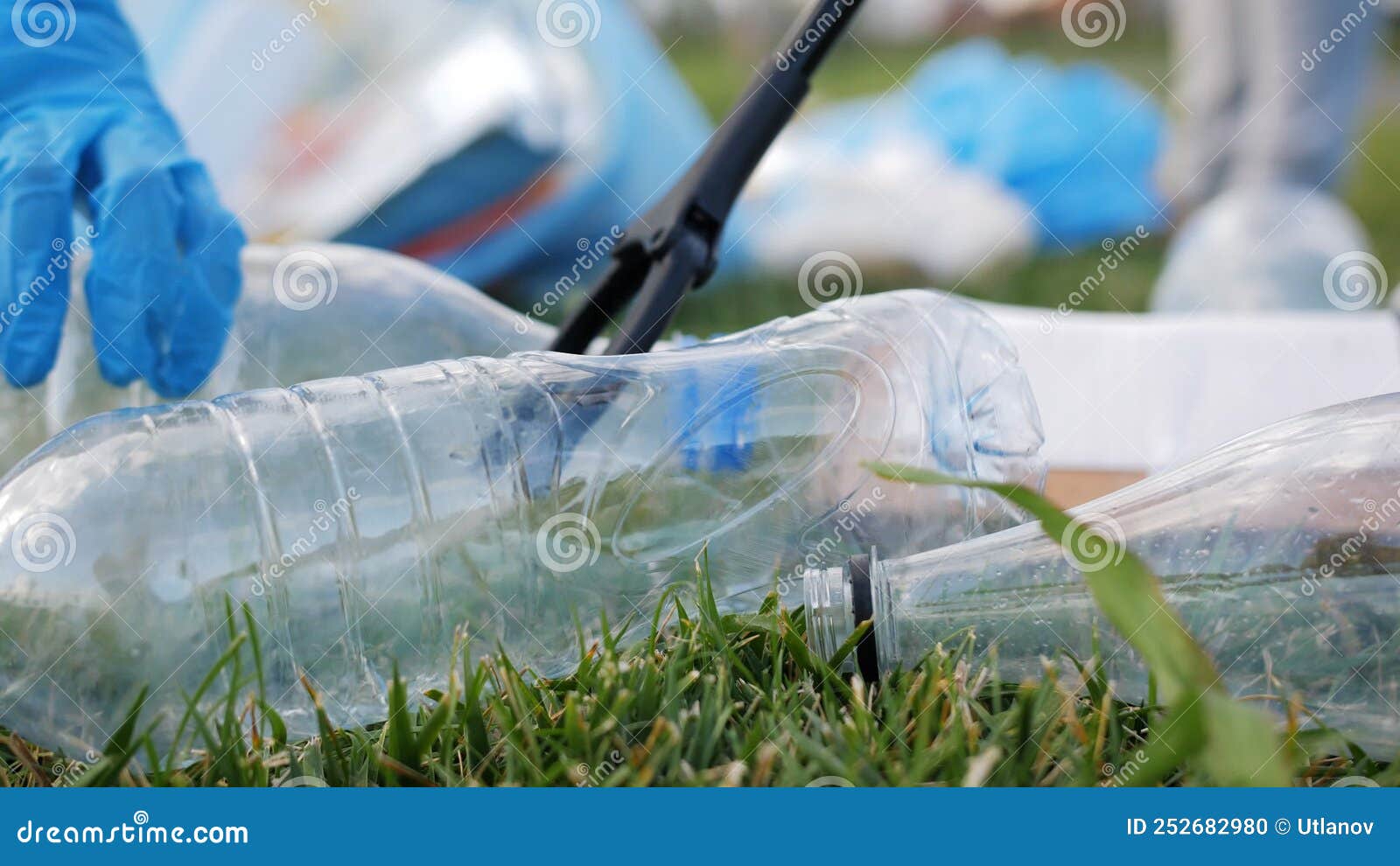 Close-up of Garbage Collection in the Park with Special Forceps on a ...