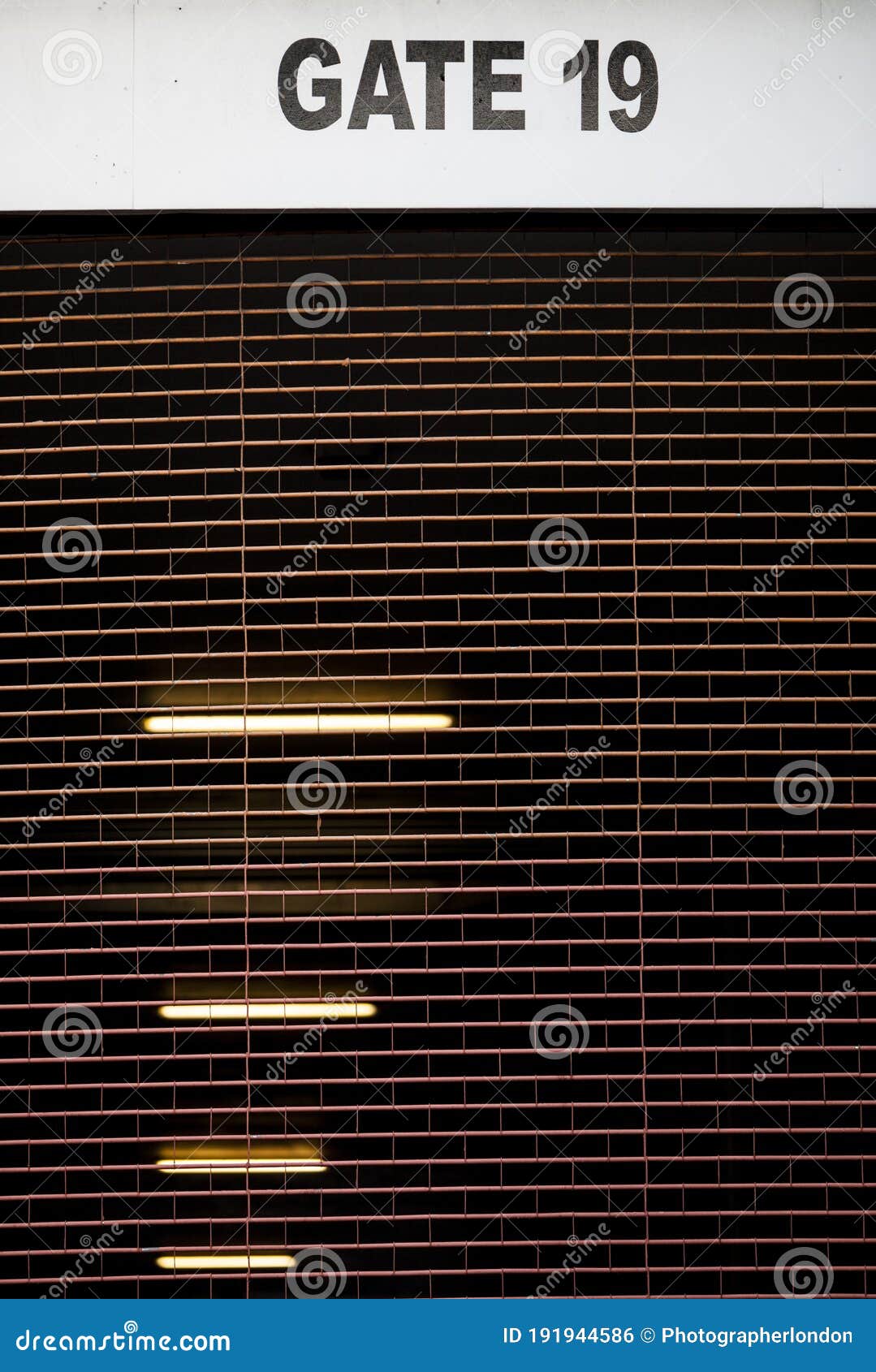 Close Up of `GATE 19` Sign on Ceiling Stock Photo - Image of ...