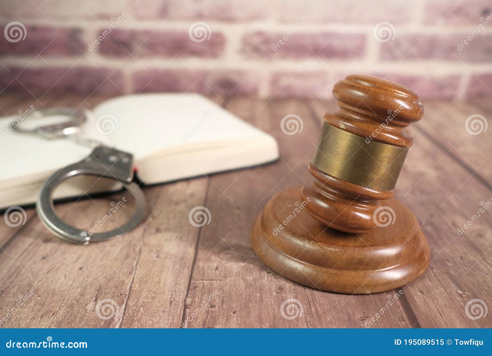 Close Up of Gavel , Handcuff and a Book on Table Stock Image - Image of ...