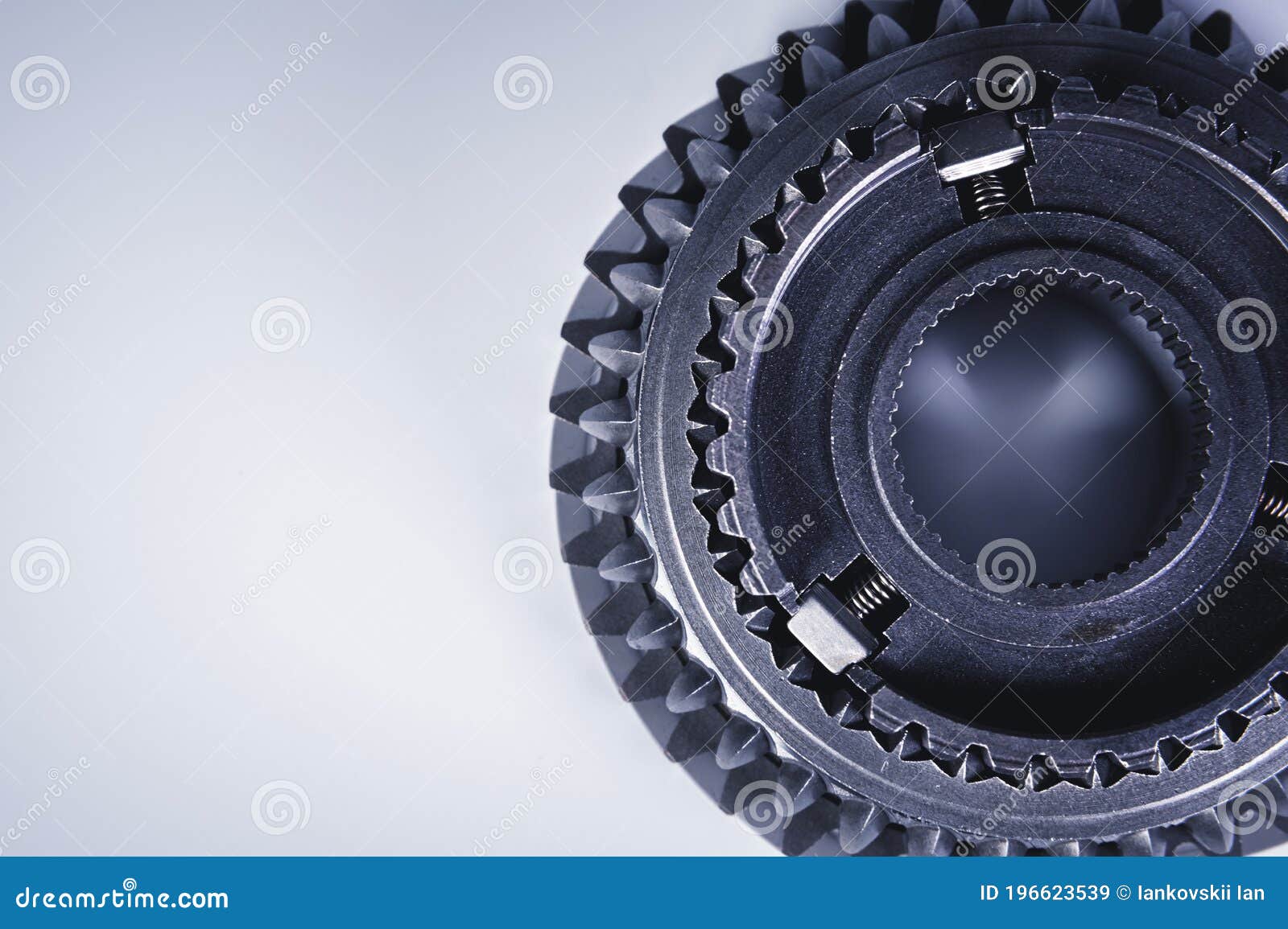 Close-up of a Gear Wheel in a Gearbox on a Gray Background. Mechanical ...