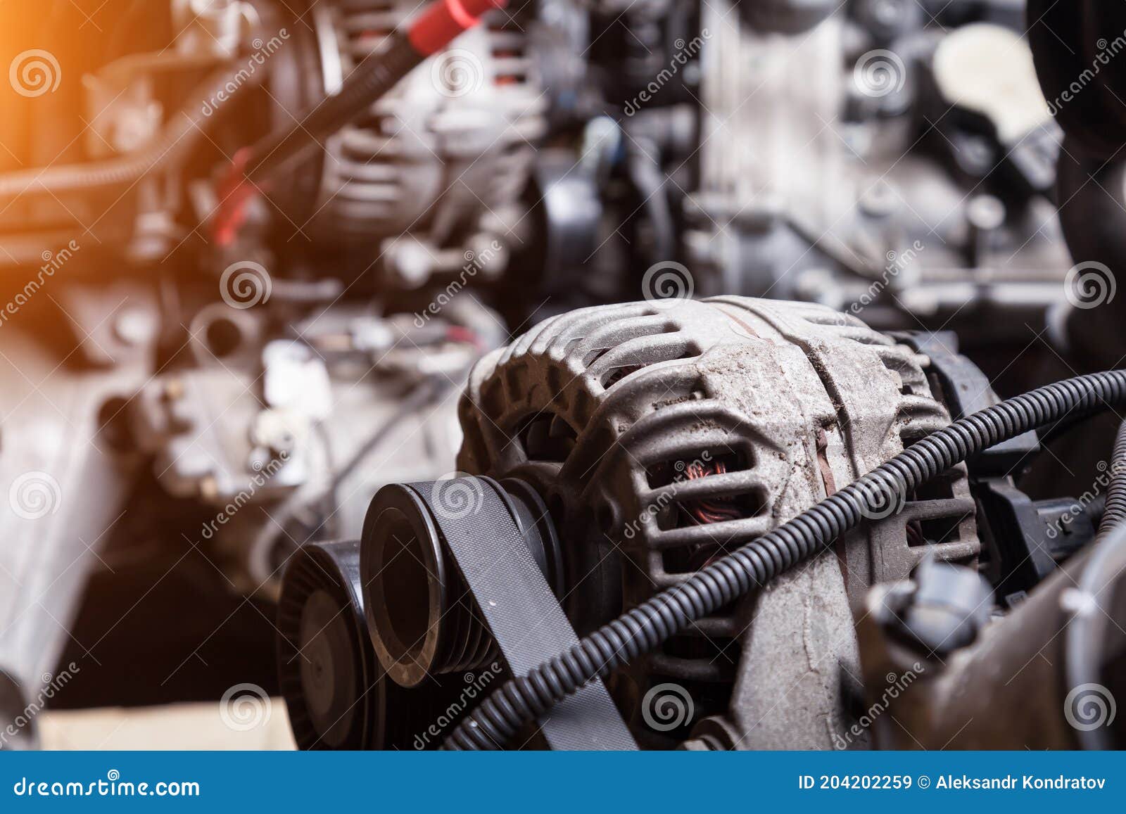 Close-up of the Generator on an Engine with a Bypass Belt is a Part in ...