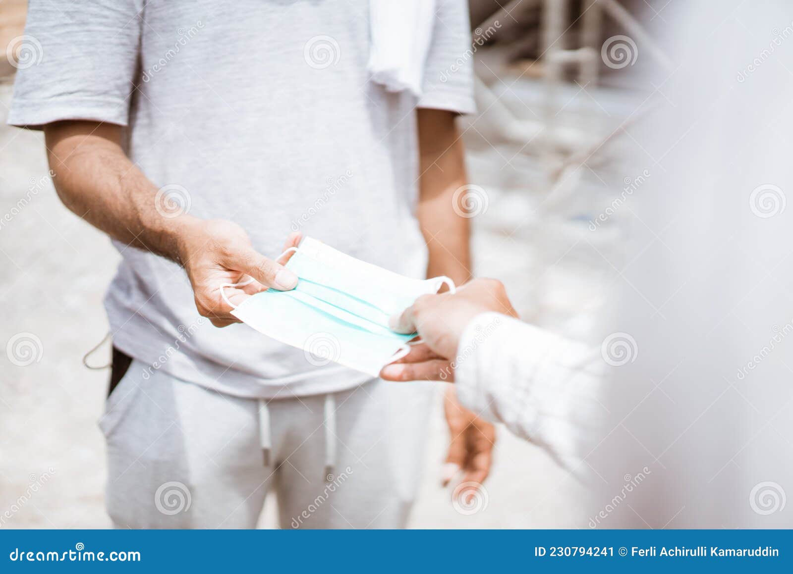 Gesture of Hand Giving a Mask To Someone Stock Image - Image of ...