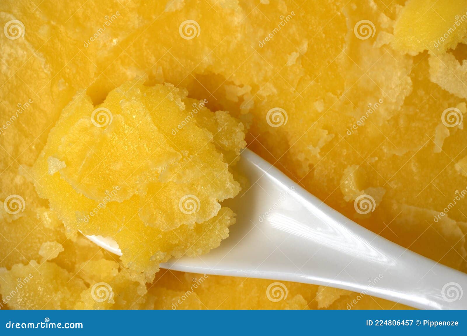 Close Up of Ghee Butter with Ceramic Spoon on it Stock Image - Image of ...