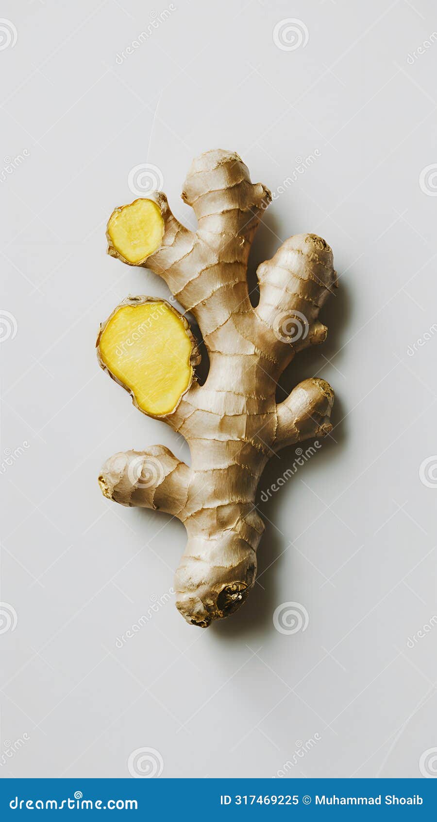 Close Up Ginger Root with Sliced Section Against White Background ...