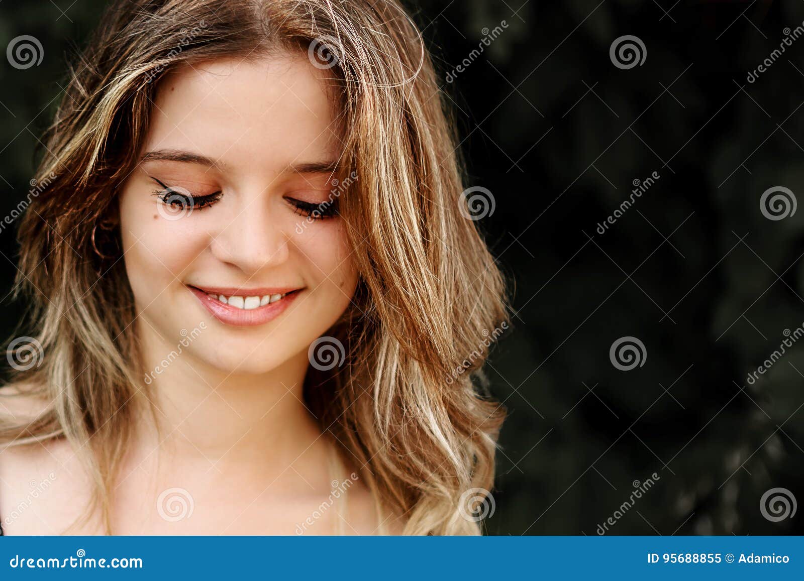 Close Up of Girl with the Look Down Stock Image - Image of smiling ...