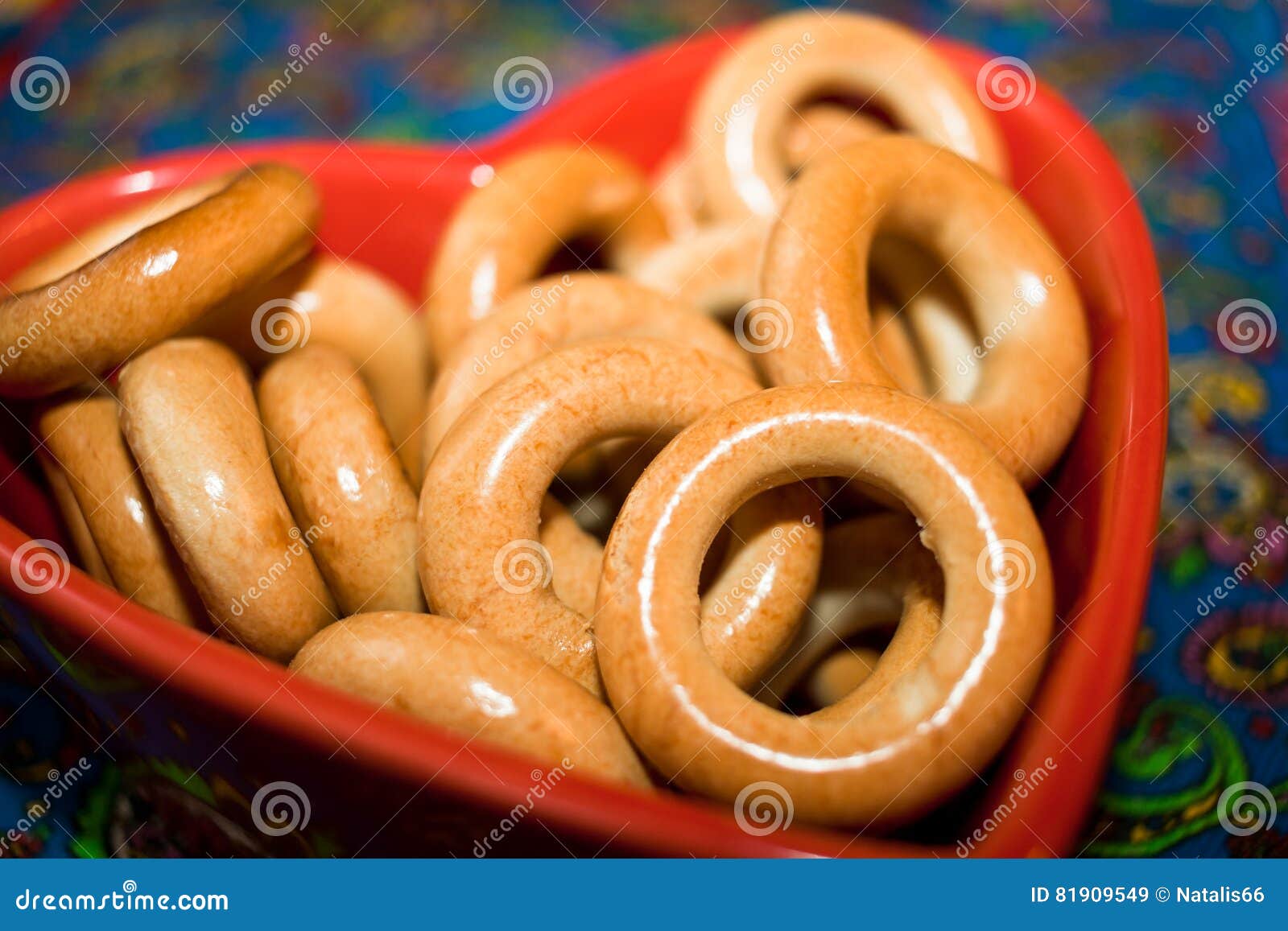 Close-up Glazed Bagels On Red Plate In Shape Of Heart. Stock Image ...