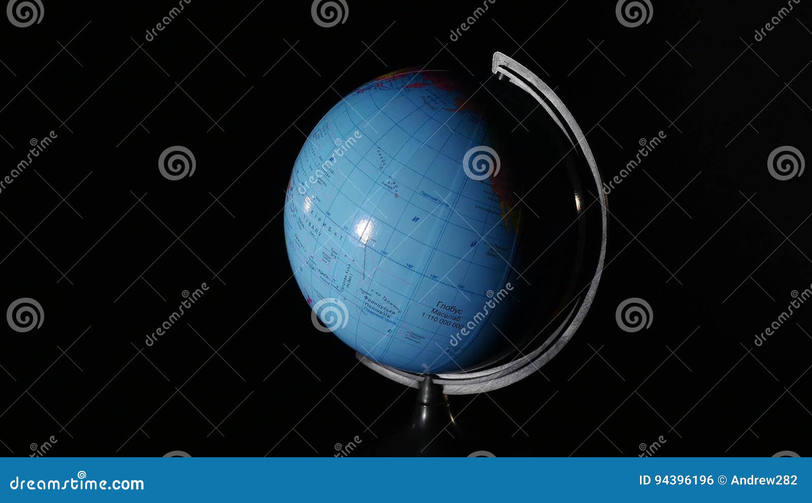 Close Up Globe Rotating on Black Background Stock Photo - Image of hand ...