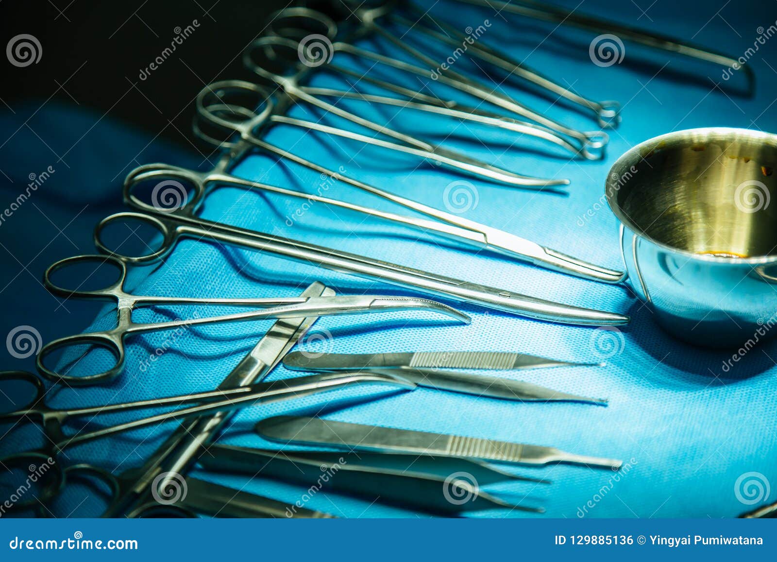 Close-up of Gloved Hands Holding Surgical Tool.Surgery Team Operating ...