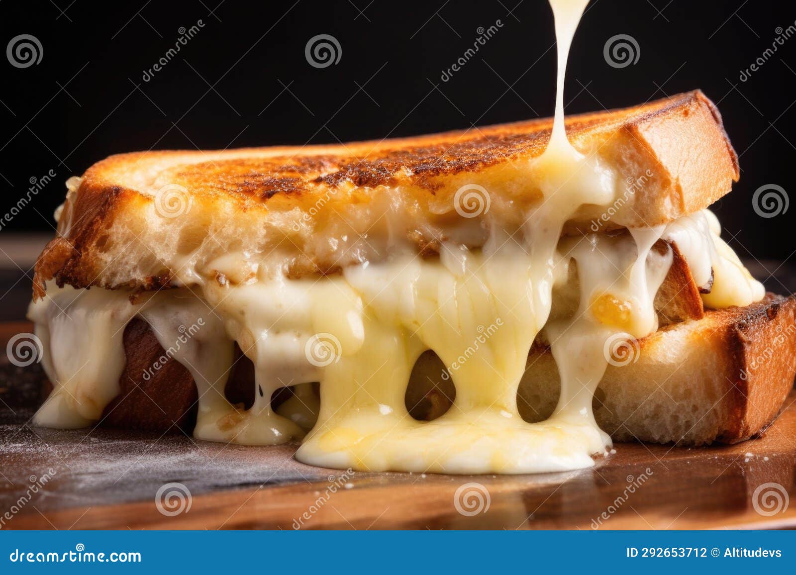 Close-up of Gooey Cheese Oozing from a Toasted Sandwich Stock Photo ...