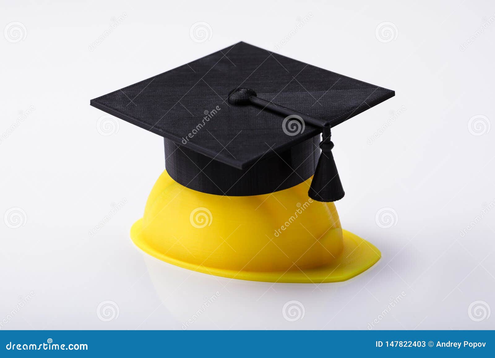 Close-up of Graduation Hat on Yellow Hardhat Stock Image - Image of ...
