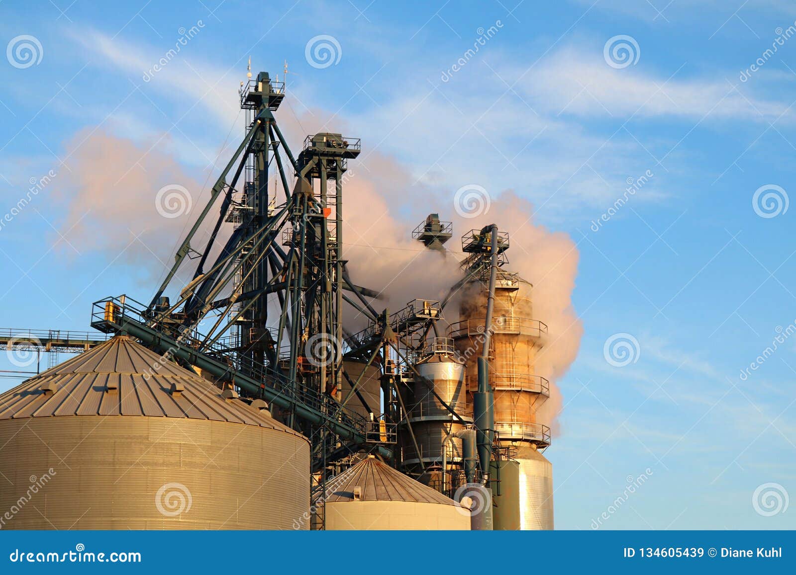 Close-up of Grain Bins with Dryer and Steam Coming Out Stock Image ...