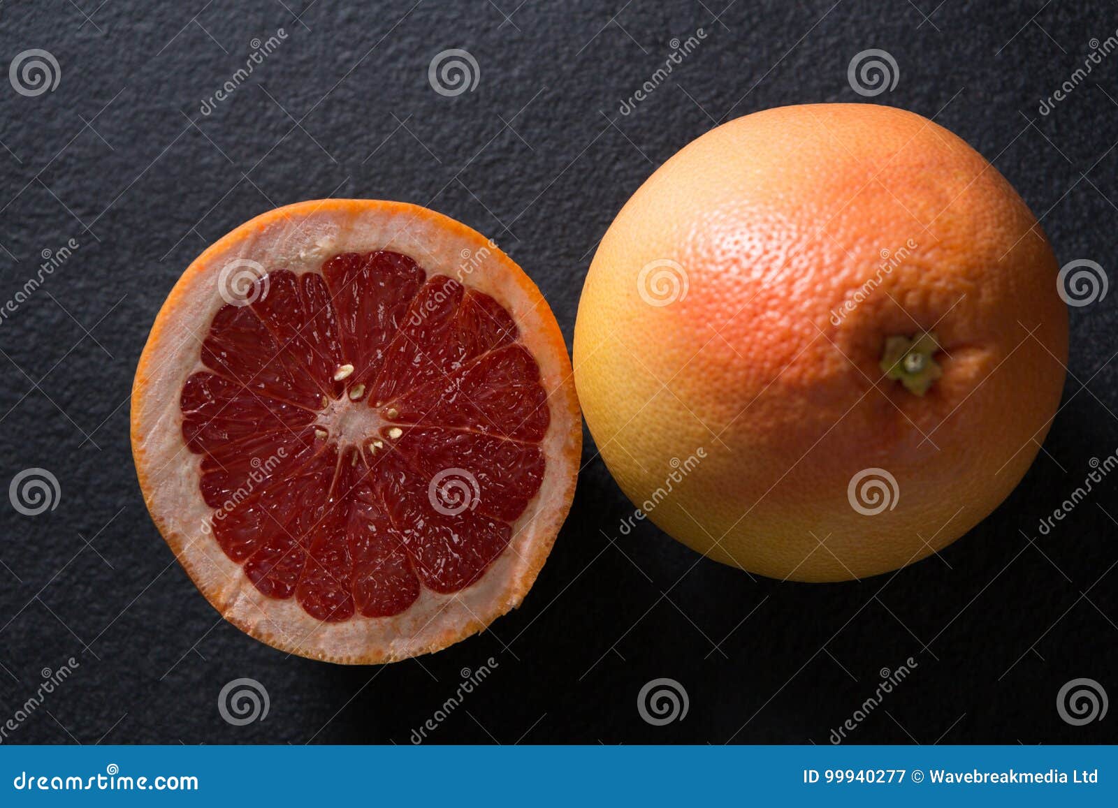 Grapefruit with Half Grapefruit on Black Background Stock Image - Image ...