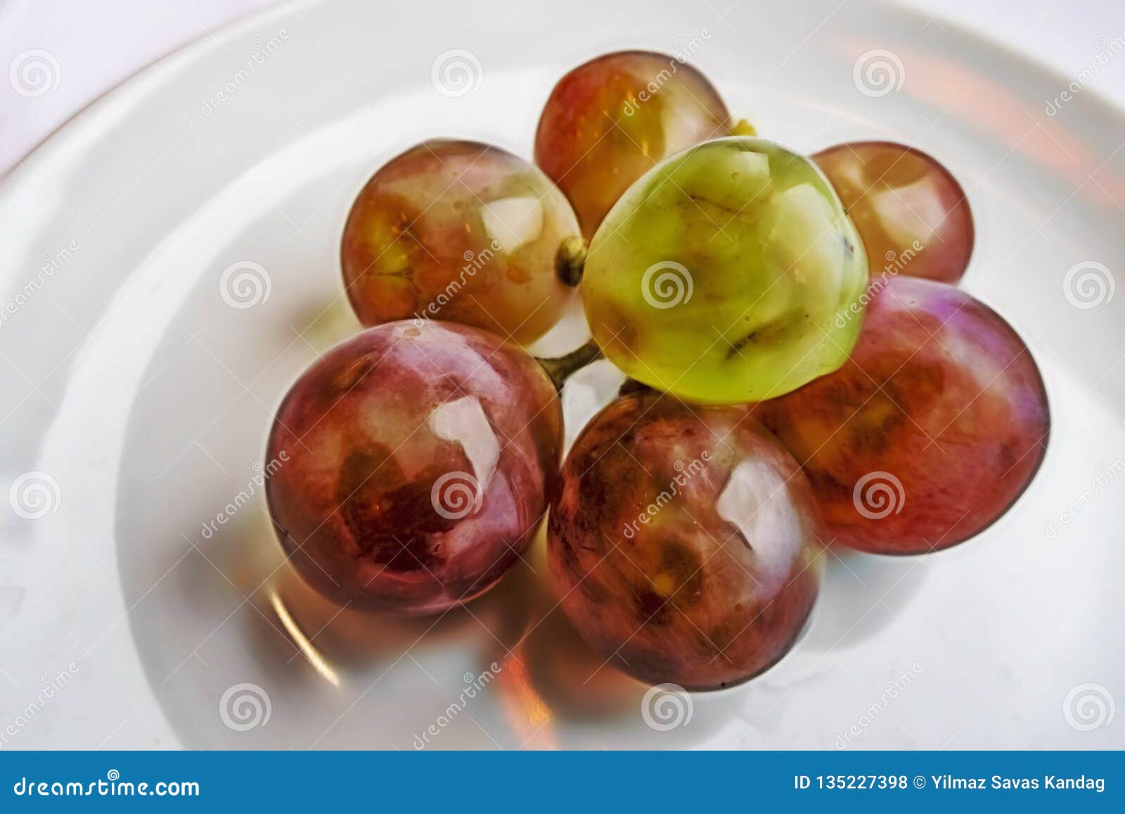 Grapes and sliced in plate stock photo. Image of ingredient - 135227398