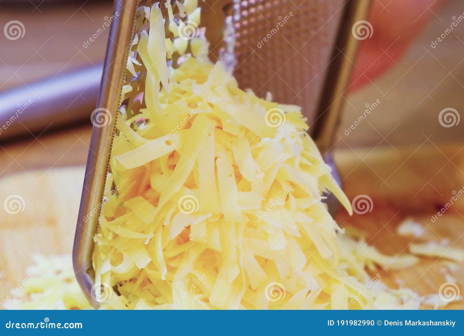 A Close-up of the Grating Process of Cheese. Stock Photo - Image of ...