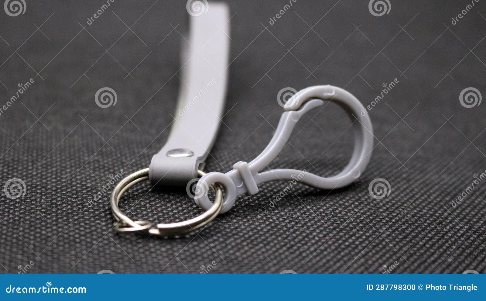 Close up gray key chain stock photo. Image of string - 287798300