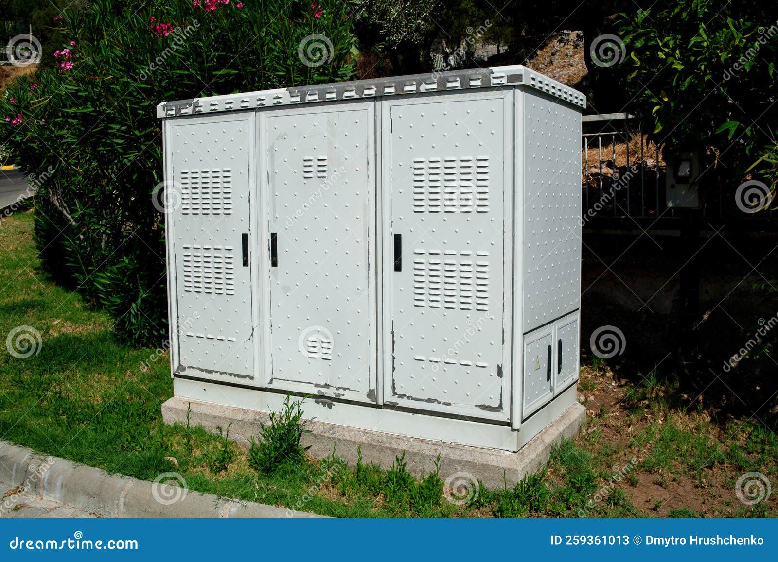 Grey Hinged Power Supply Box In The Wood. Electrical Box With Yellow ...
