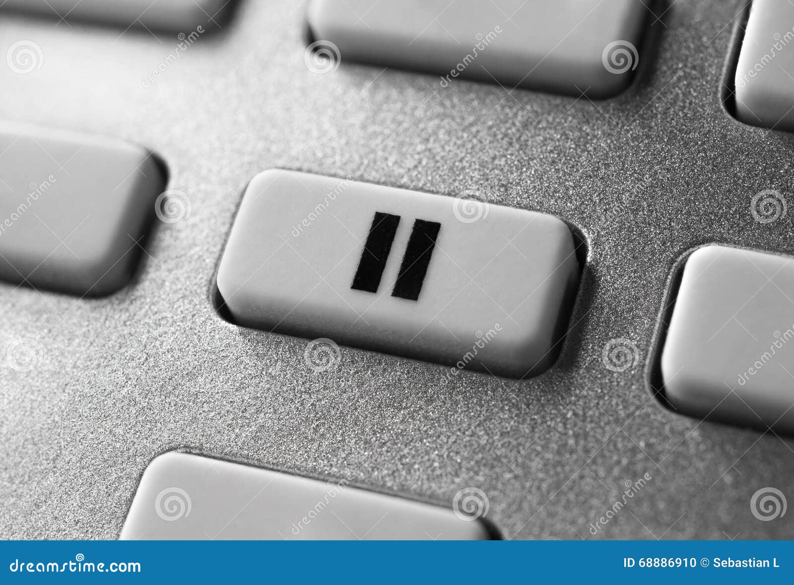 Close Up of a Grey Pause Button on Chrome Remote Control for a Hifi ...