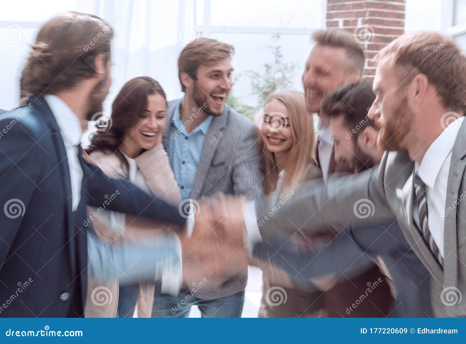 Close Up. a Group of Corporate Employees Showing Their Unity Stock ...