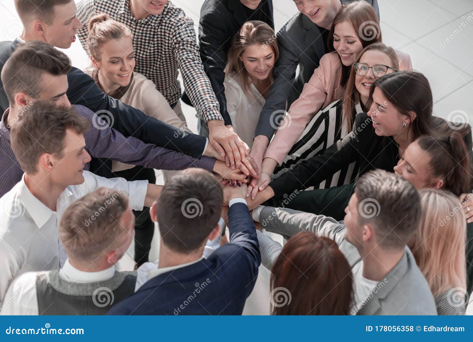 Close Up. a Group of Employees Making a Circle Out of Their Hands Stock ...