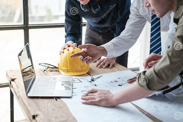 Close Up Group Engineers Discussion and Planning about Project in a ...