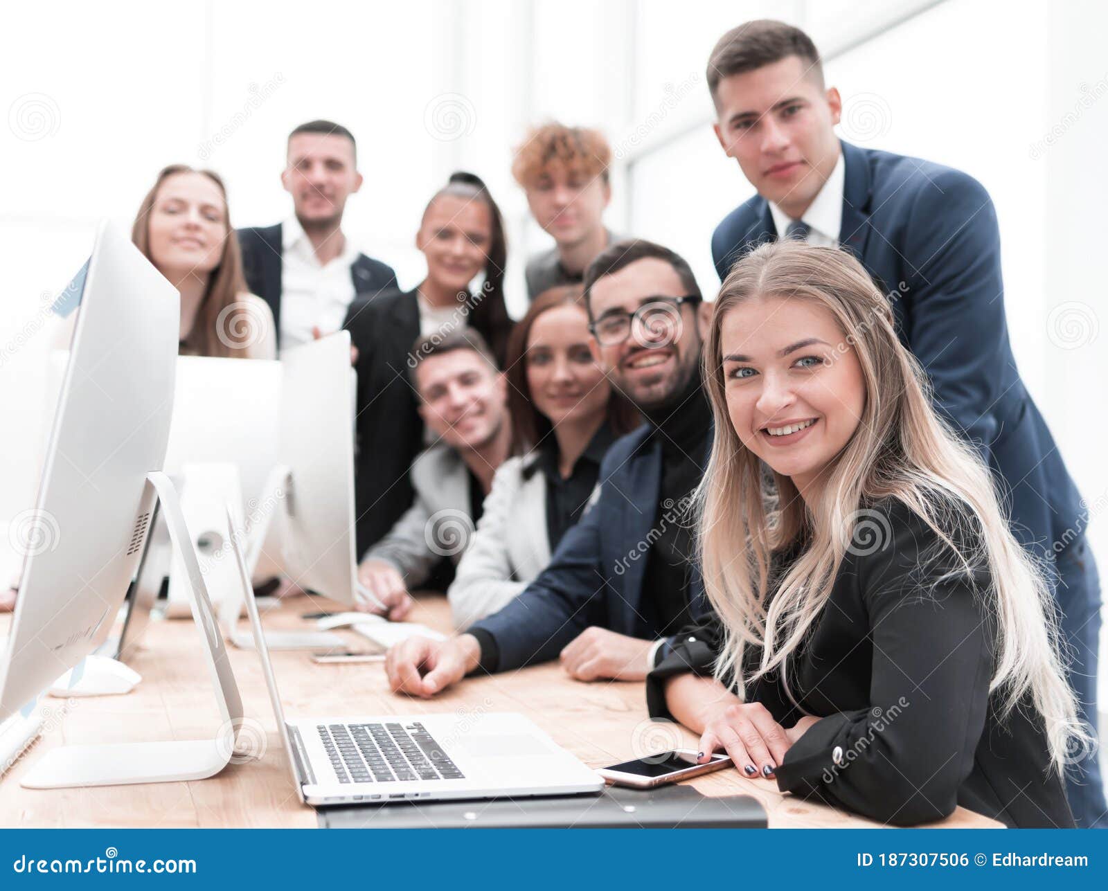 Close Up.a Group of Happy Employees in the Workplace Stock Photo ...
