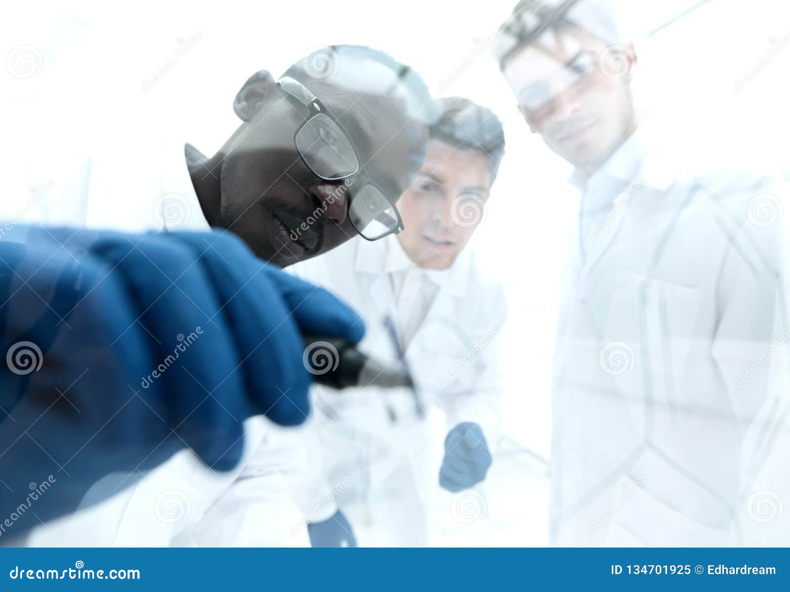 Close Up.a Group of Microbiologists Discussing the Results of Their ...