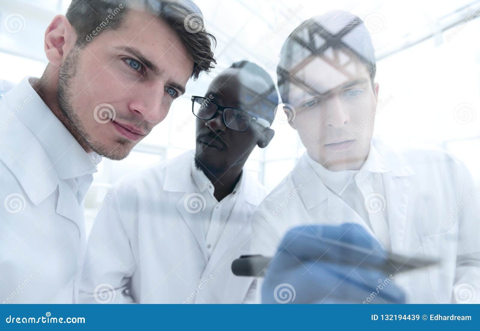 Close Up.a Group of Scientists Discussing New Ideas Stock Image - Image ...