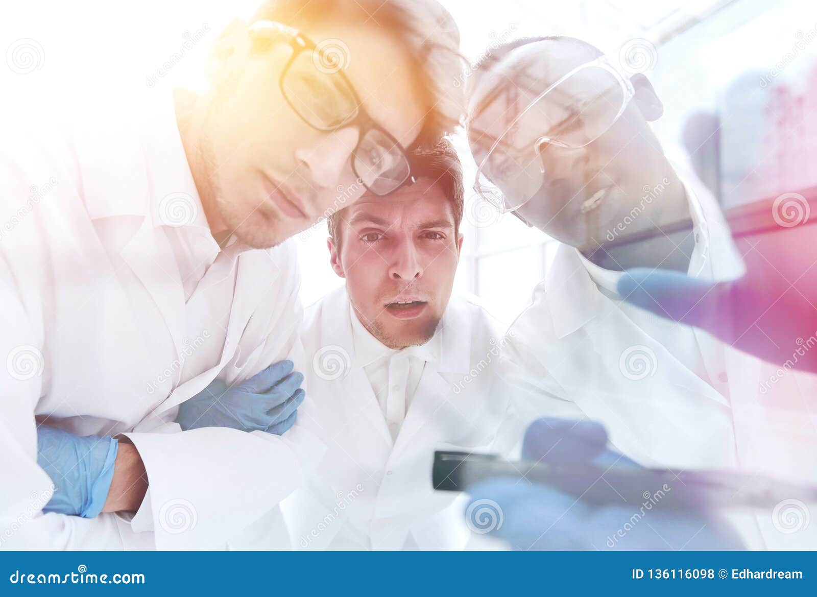 Close Up.a Group of Scientists Discussing the Results of the Exp Stock ...