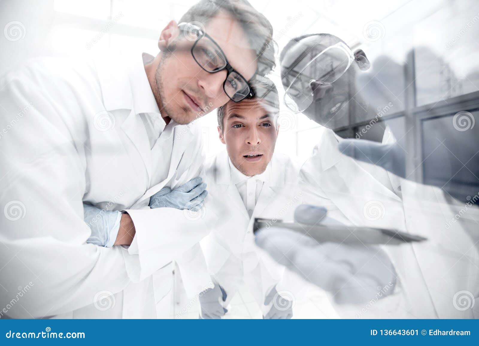 Close Up.a Group of Scientists Discussing the Results of the Experimen ...