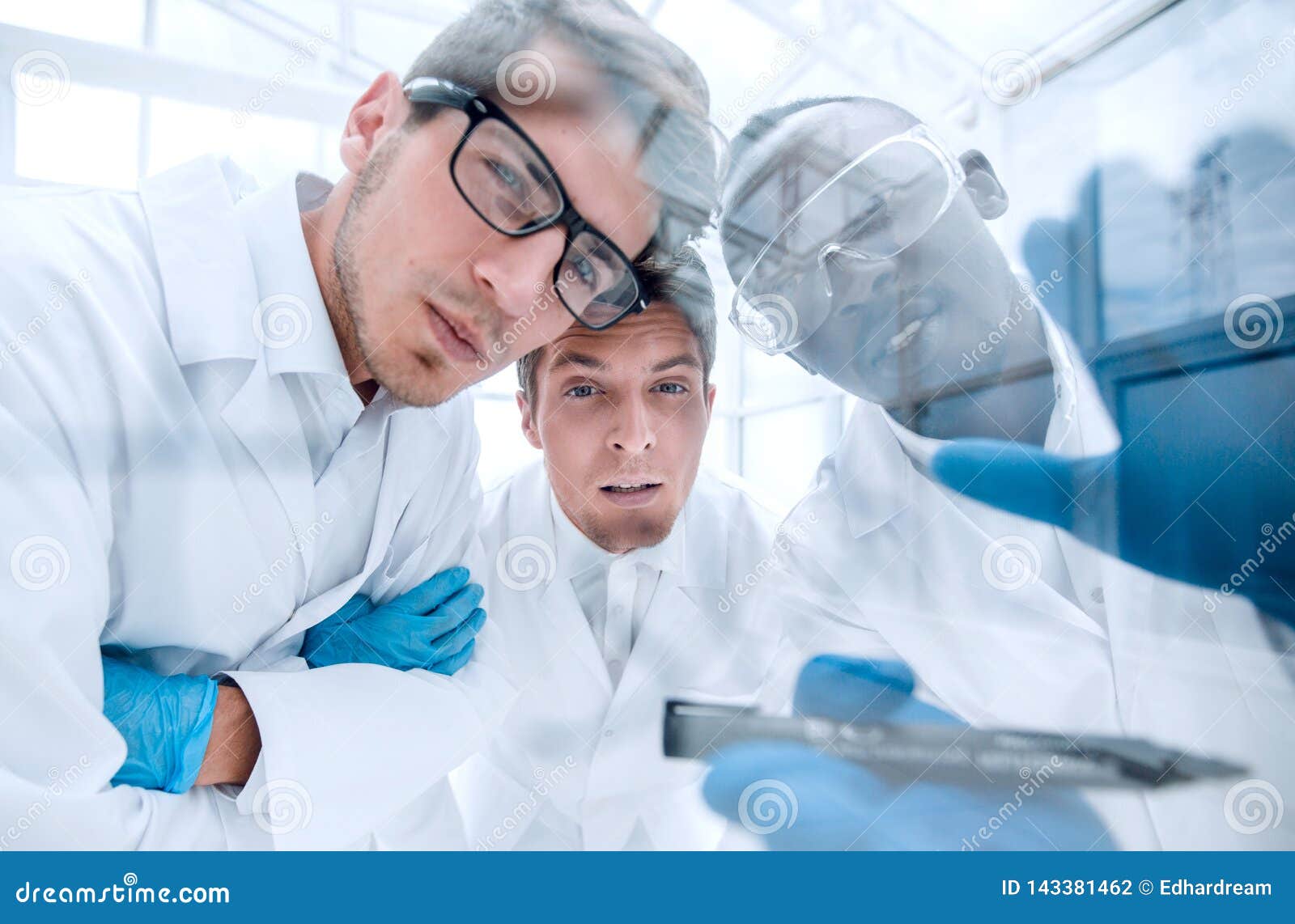 Close Up.a Group of Scientists Discussing the Results of the Experimen ...