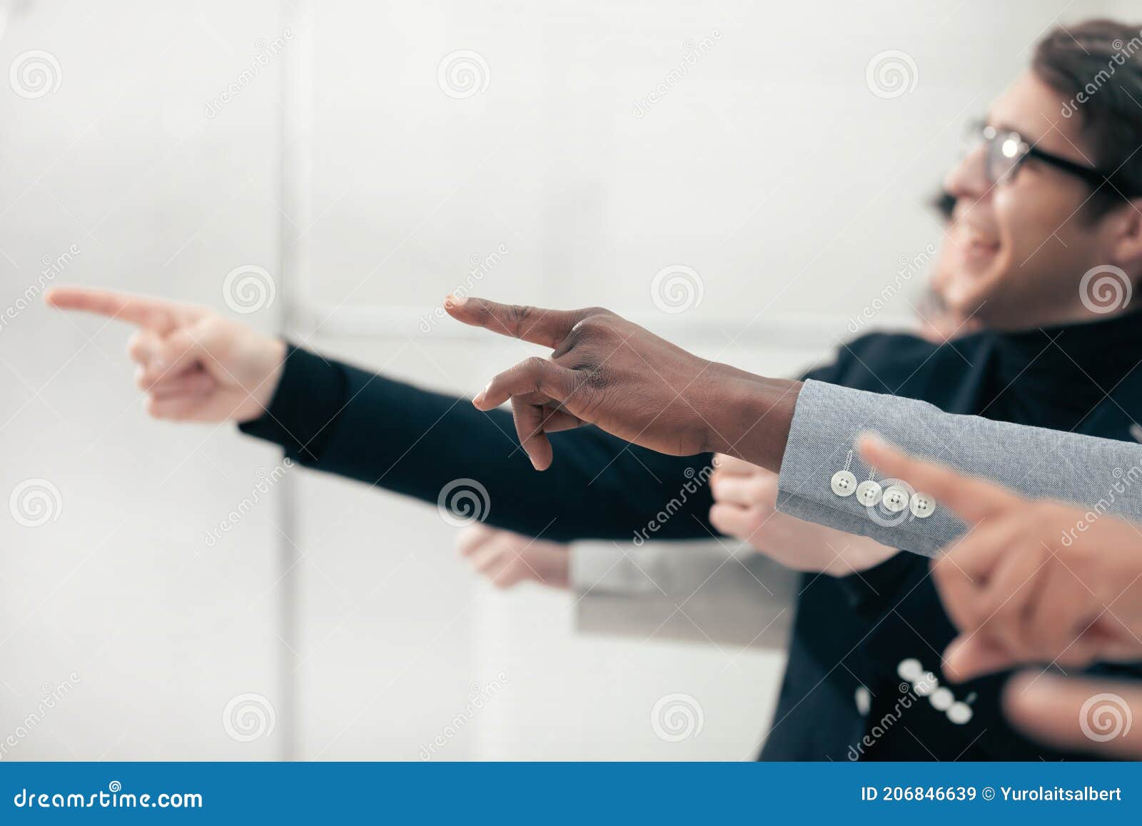 Group of Smiling Business People Pointing Pointing Forward Stock Image ...