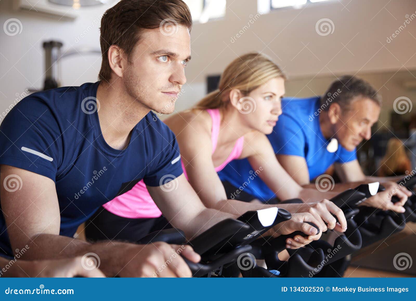 Close Up of Group Taking Spin Class in Gym Stock Photo - Image of group ...
