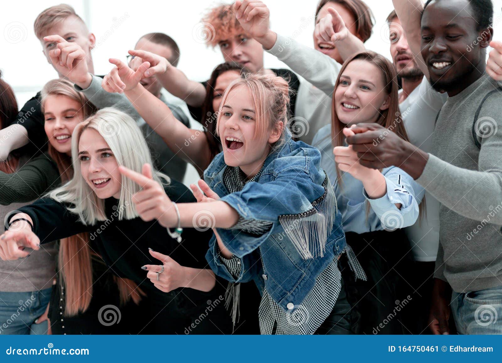Close Up. a Group of Young People Pointing at One Point Stock Image ...