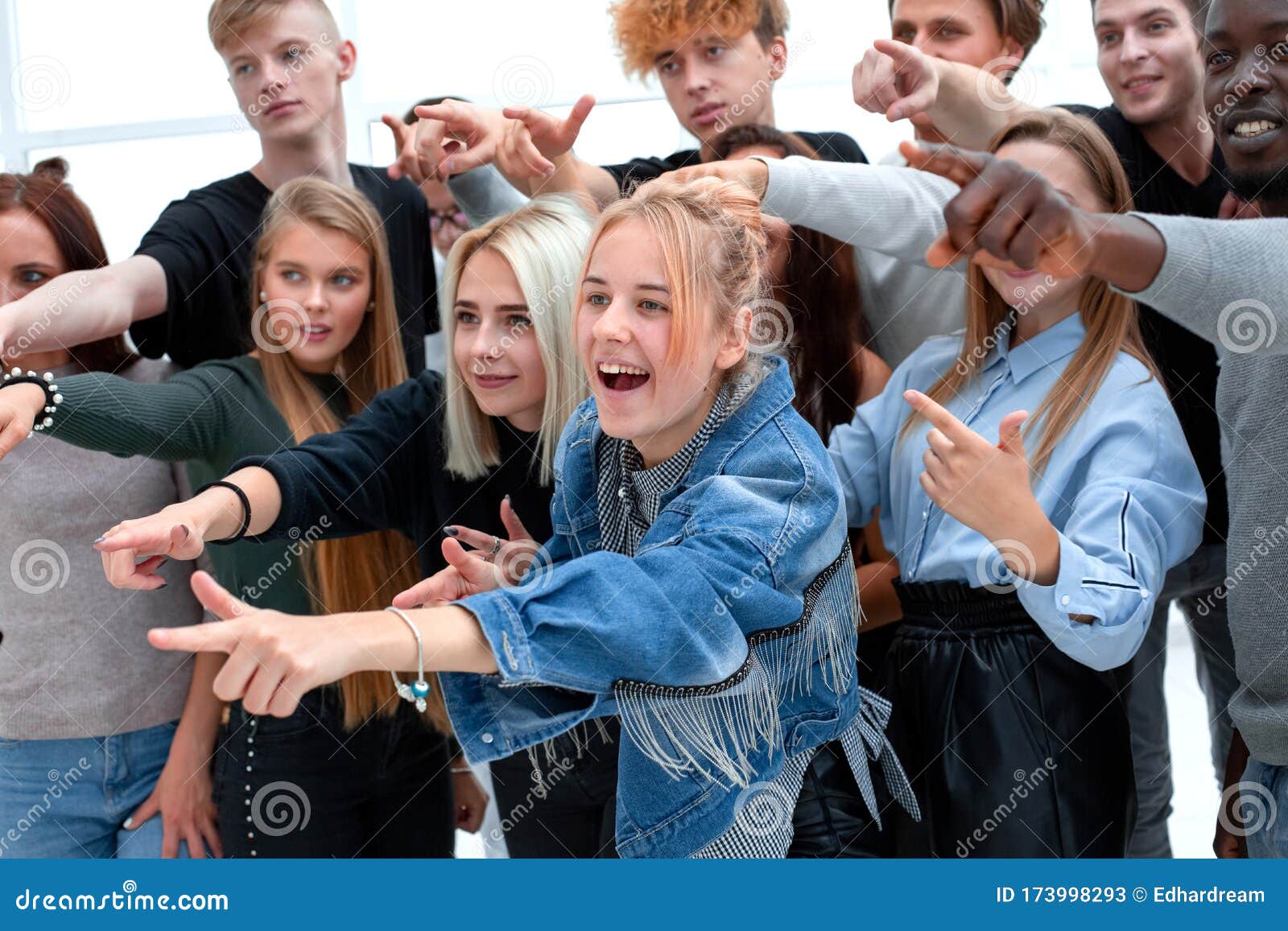 Close Up. a Group of Young People Pointing at One Point Stock Image ...
