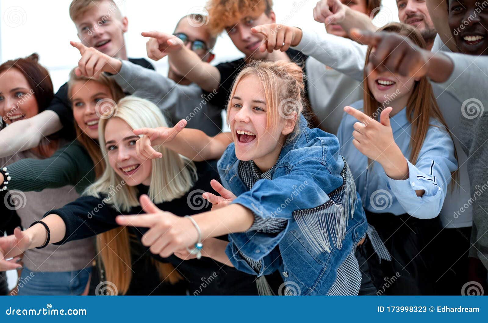 Close Up. a Group of Young People Pointing at One Point Stock Image ...