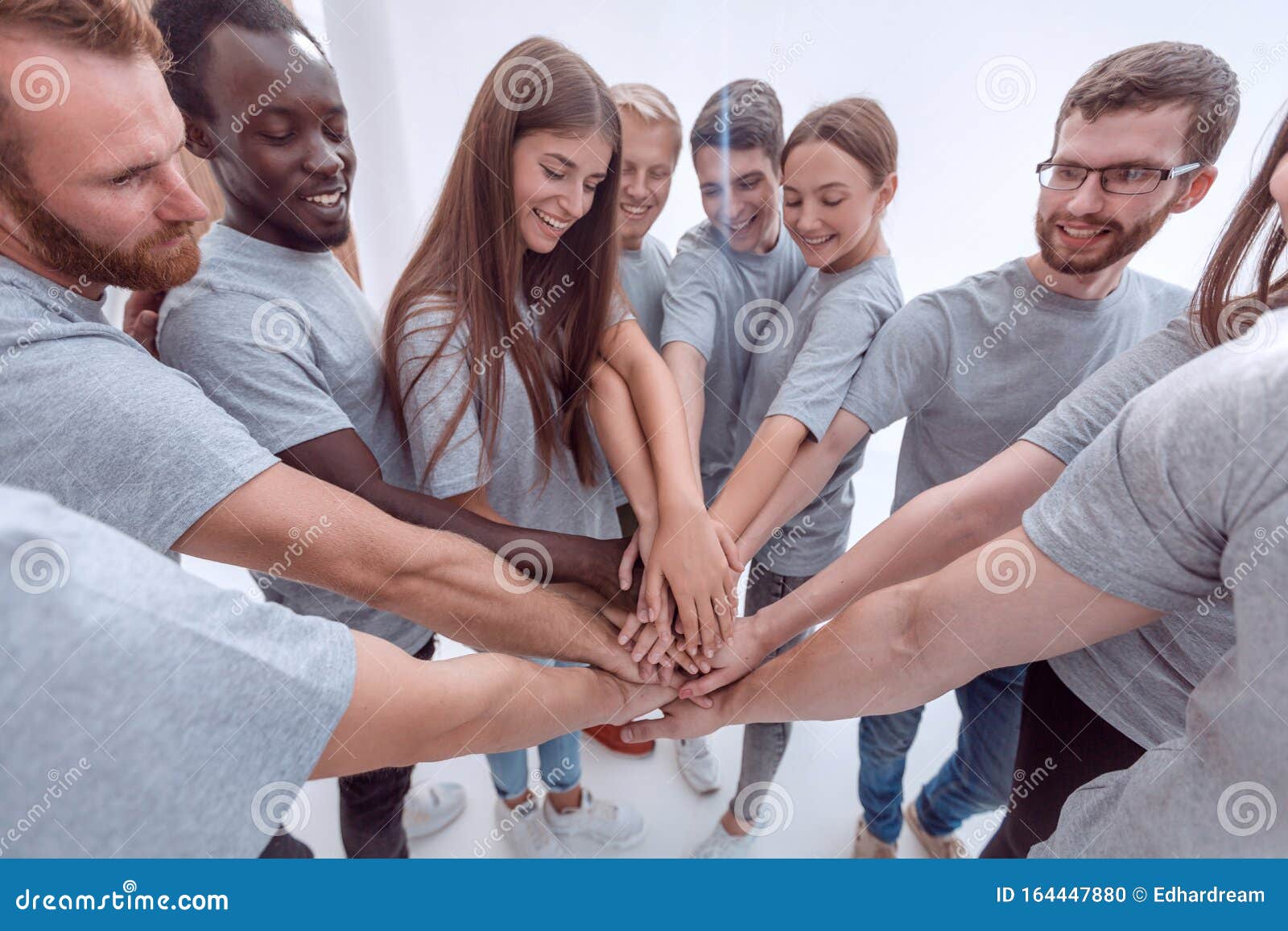 Close Up. a Group of Young People Showing Their Unity Stock Photo ...