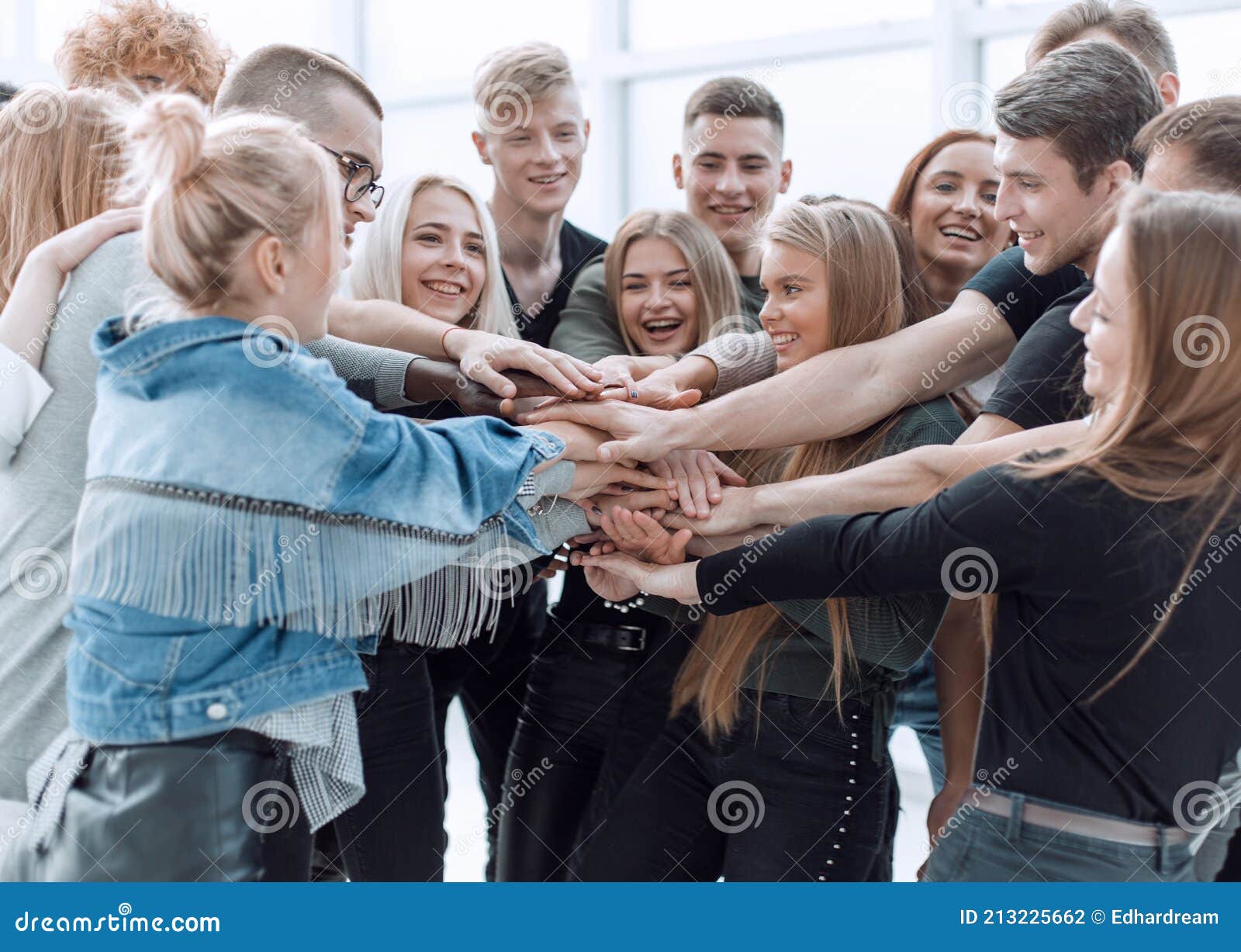 Close Up. a Group of Young People Showing Their Unity Stock Photo ...