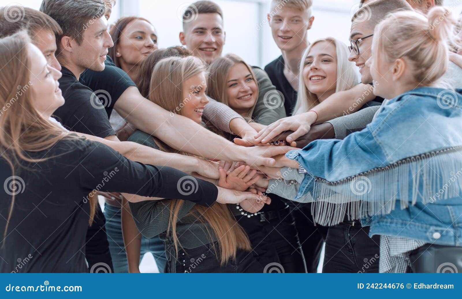Close Up. a Group of Young People Showing Their Unity Stock Photo ...