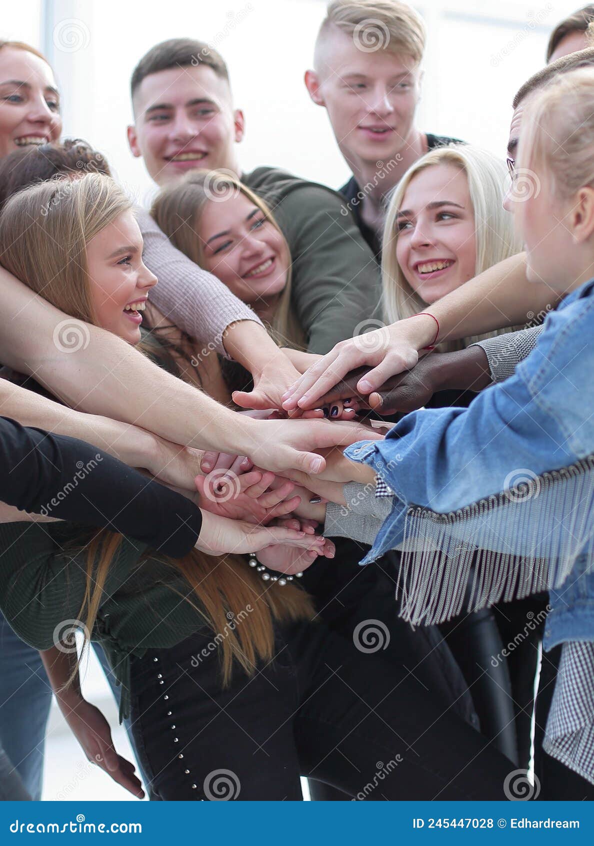 Close Up. a Group of Young People Showing Their Unity Stock Photo ...
