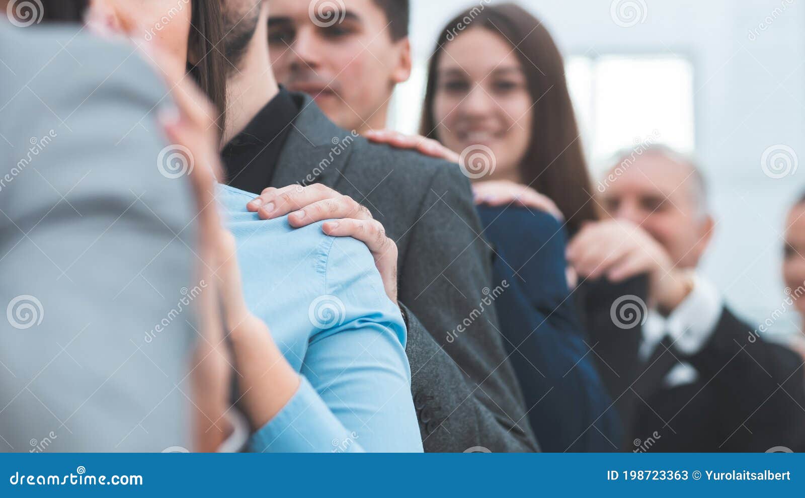 Close Up. a Group of Young Professionals Supporting Each Other Stock ...