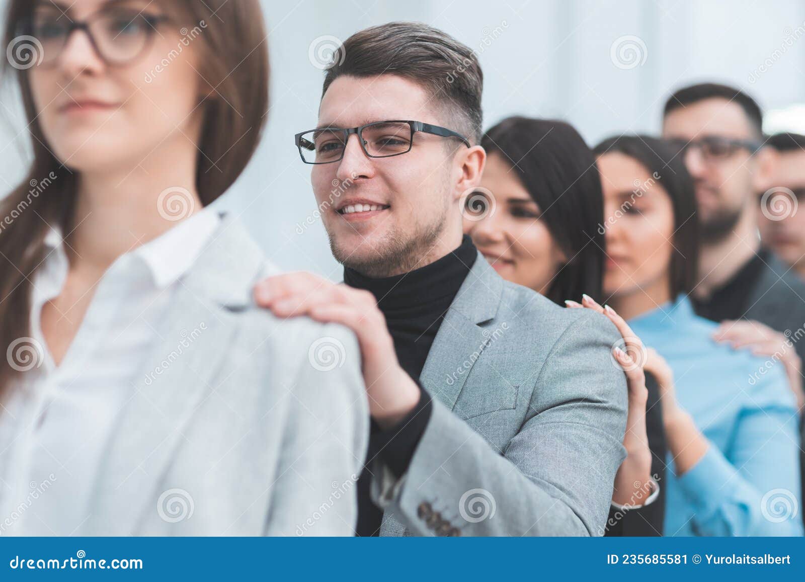 Close Up. a Group of Young Professionals Supporting Each Other Stock ...