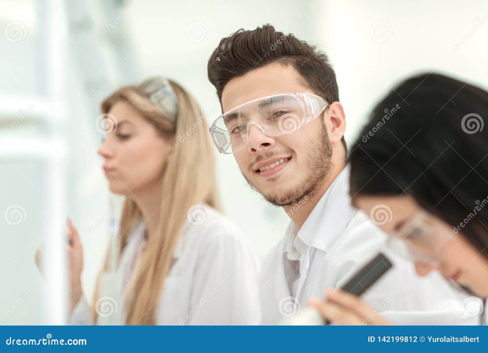 Close Up.a Group of Young Scientists in the Laboratory Stock Photo ... Close Up.a Group of Young Scientists in the Laboratory Stock Photo ...
