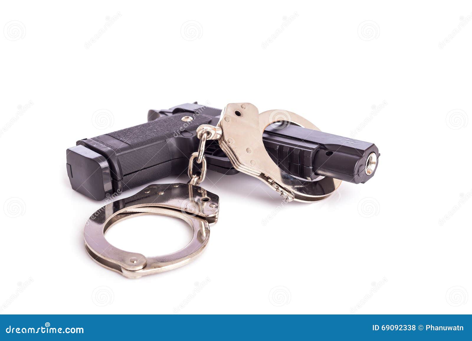 Close Up Gun and Handcuffs Isolated on White Stock Photo - Image of ...