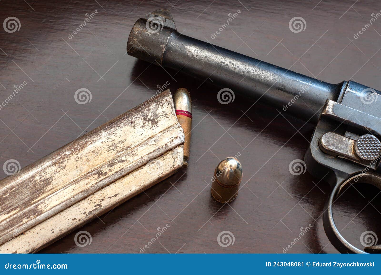 Gunpoint and Bullets on Table. Weapons and Ammunition Stock Image ...