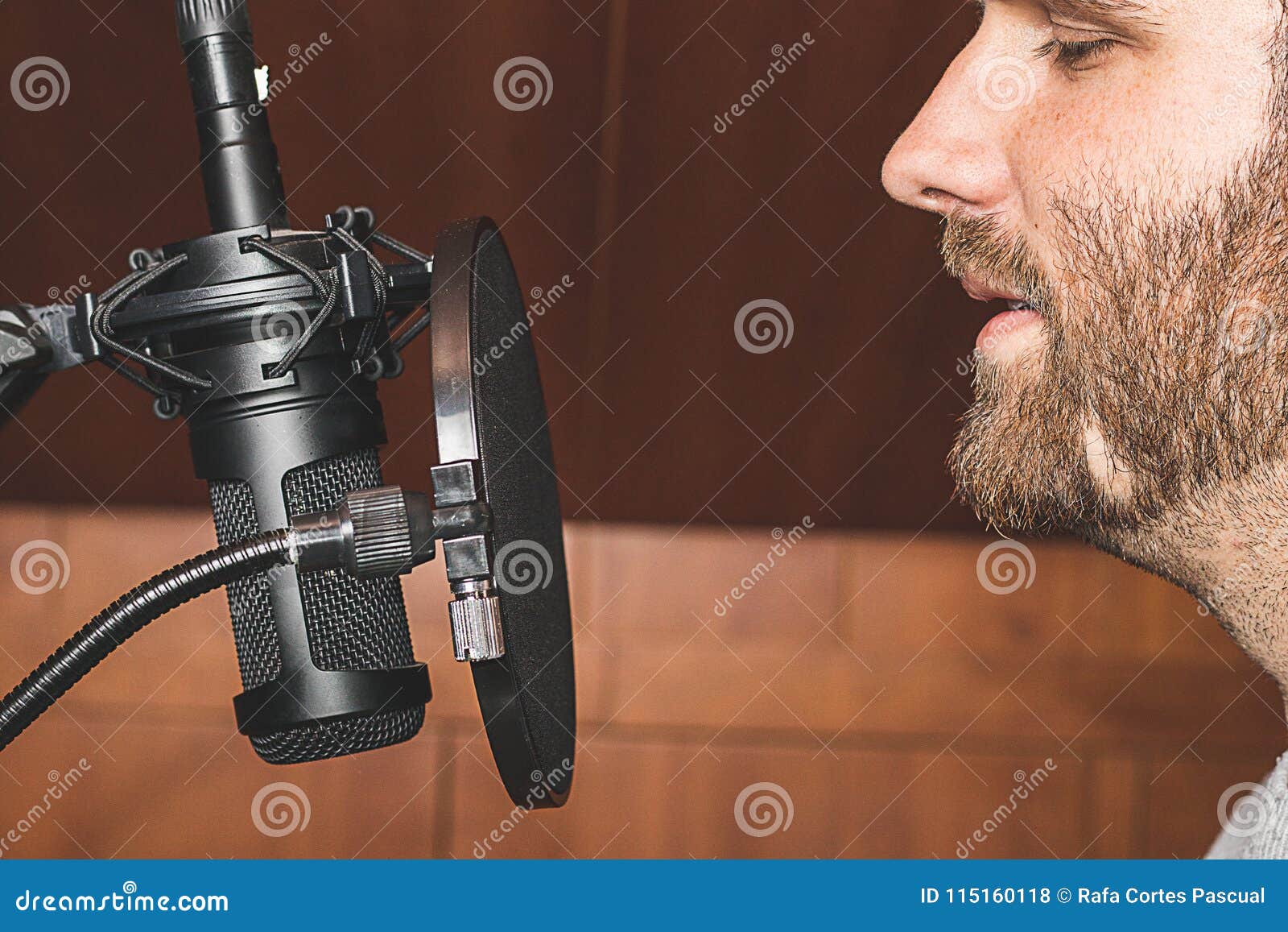 Close-up of a Guy Singing on a Microphone Stock Photo - Image of ...