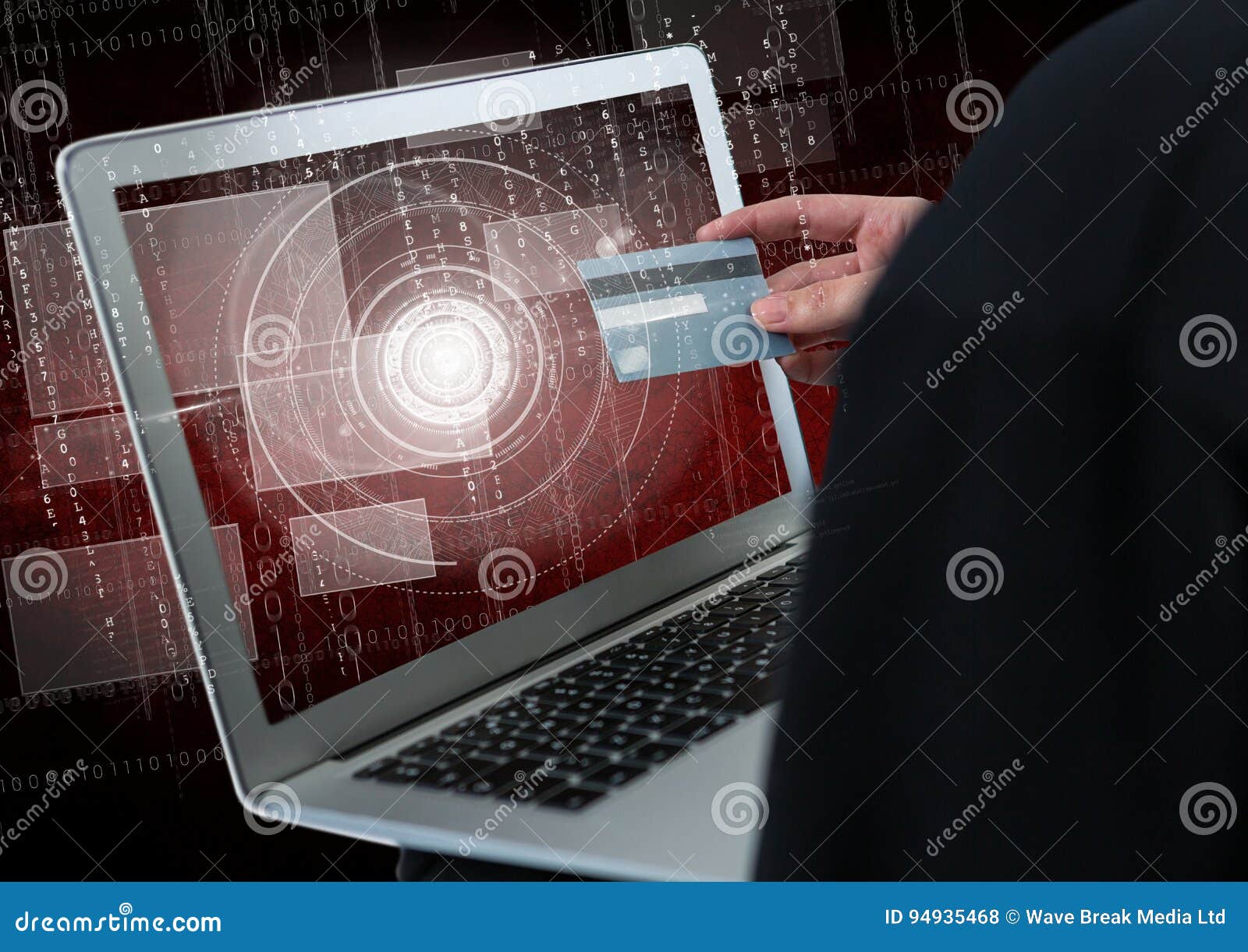 Close Up of Hacker S Hand Using a Laptop while Holding a Credit Card ...