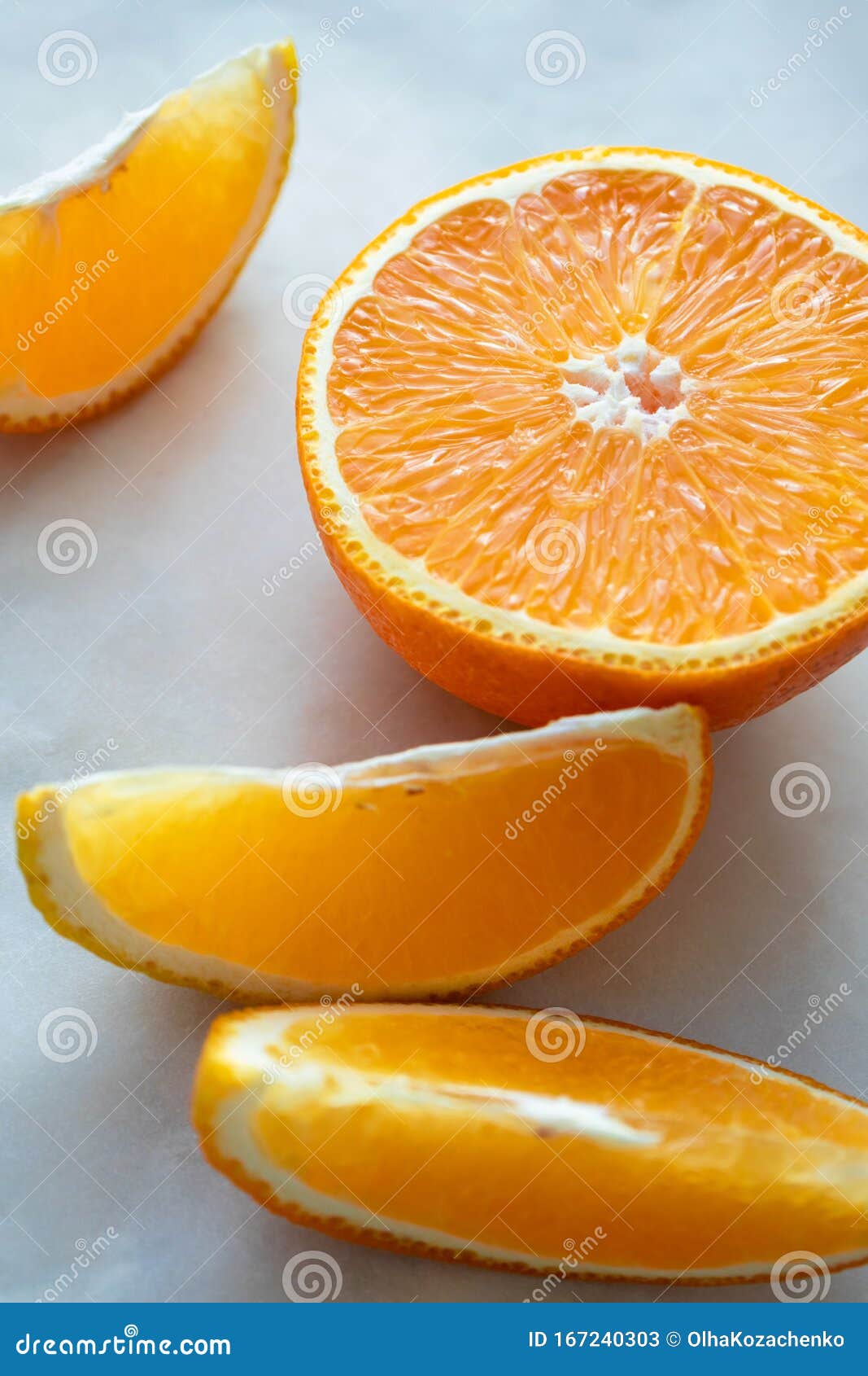 Close-up Half of Orange and Slice on Light Table Surface. Fresh Citrus ...
