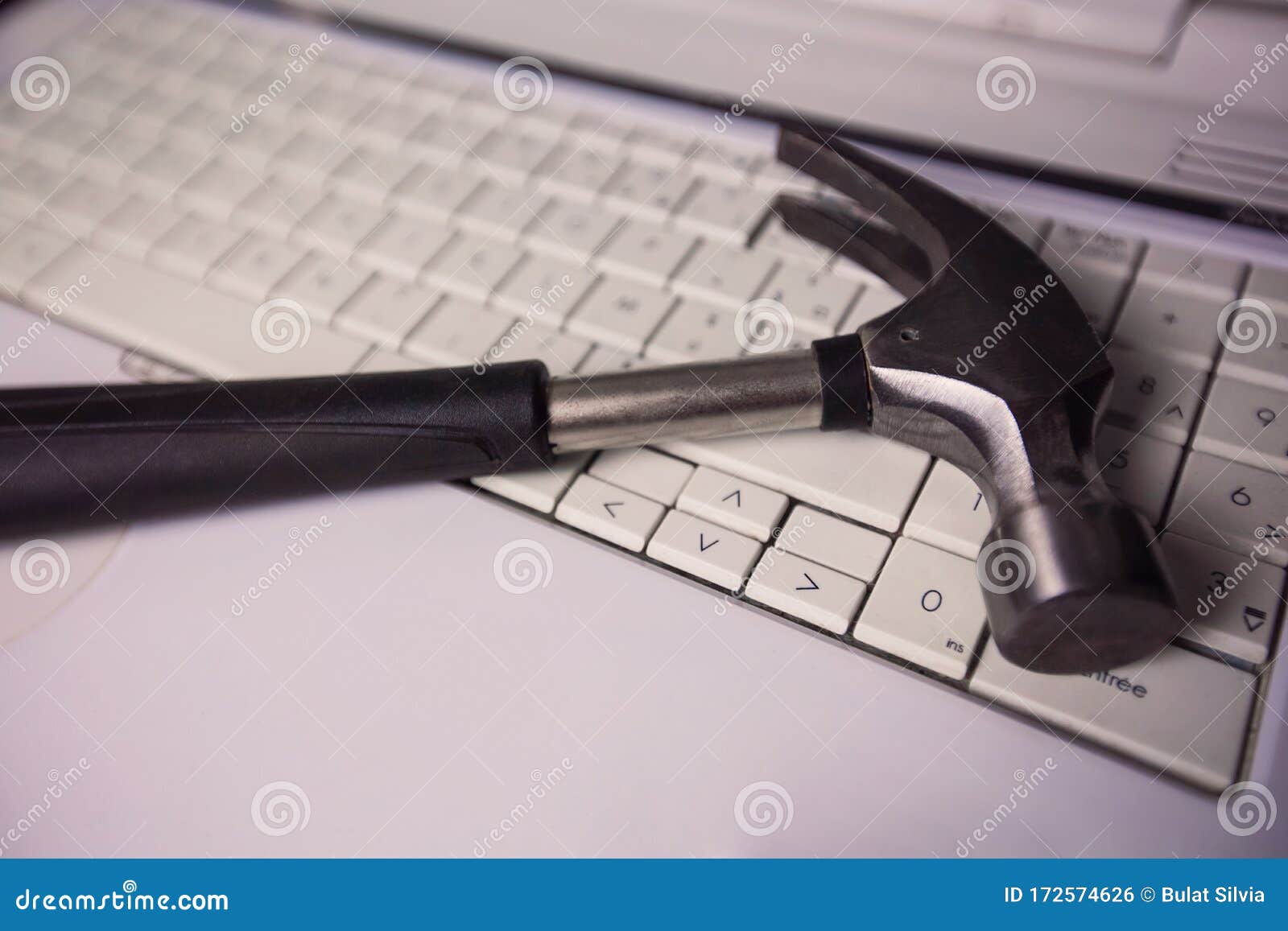 Close Up of a Hammer on an Old Laptop Keyboard. Computer Repair ...
