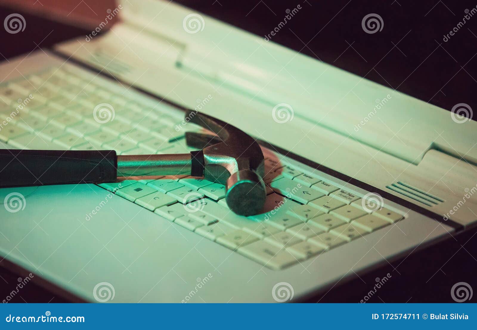Close Up of a Hammer on an Old Laptop Keyboard. Computer Repair ...